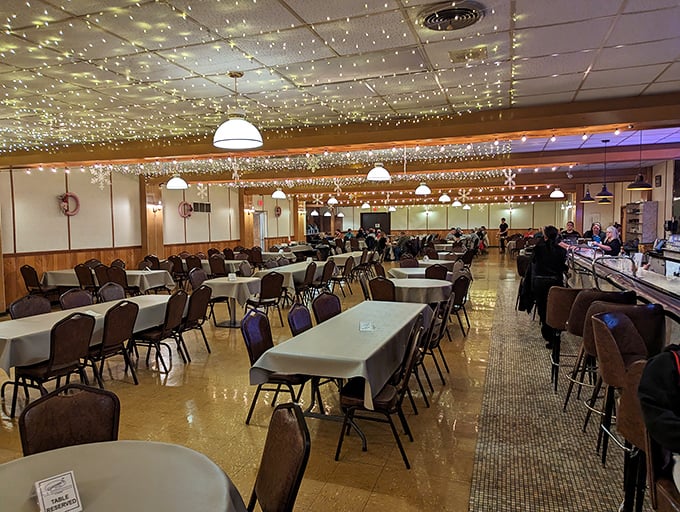 Twinkling ceiling lights transform this classic dining room into a magical space where fish fry dreams come true.