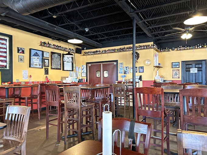 High ceilings, wooden chairs, and walls adorned with accolades &ndash; Pappy's dining room is where barbecue dreams come true, not fancy, just focused.