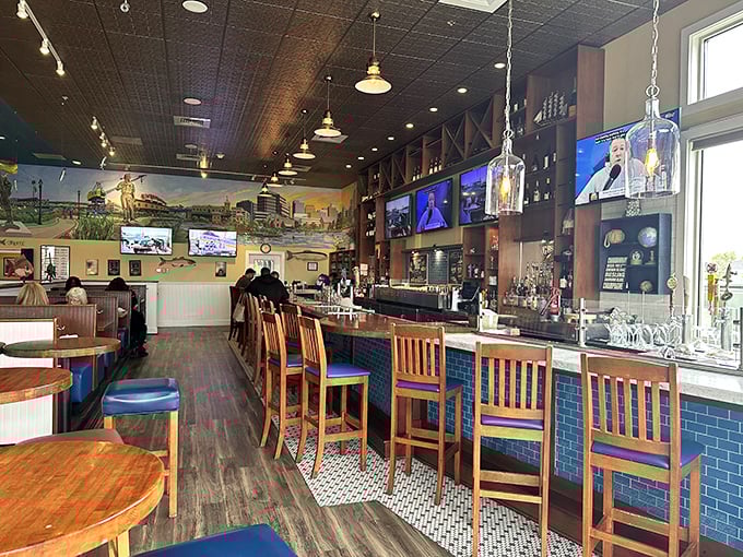 Inside, the warm wood tones and blue-tiled bar create an atmosphere that's equal parts upscale dining and comfortable neighborhood hangout.