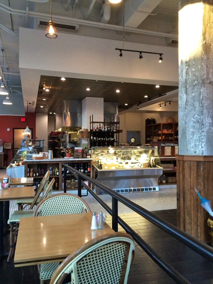 The modern-meets-cozy interior strikes that perfect balance—sophisticated enough for a business meeting, comfortable enough for your weekend hangover cure.