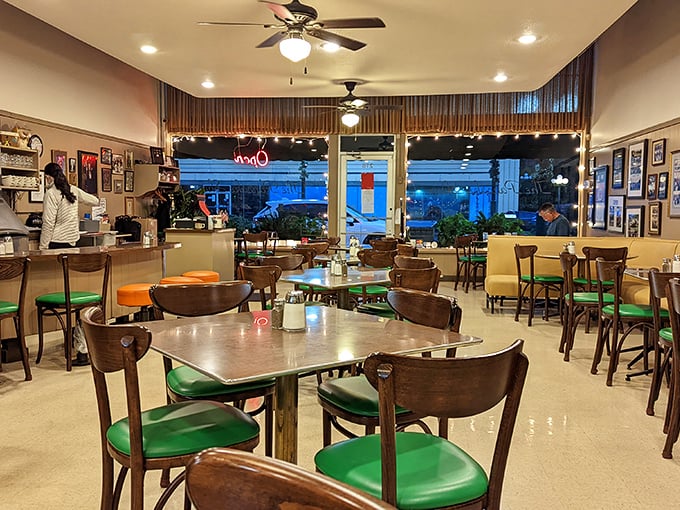 Inside, wooden chairs with bright green seats create that perfect nostalgic diner atmosphere&mdash;where breakfast dreams come true and calories don't count until tomorrow.