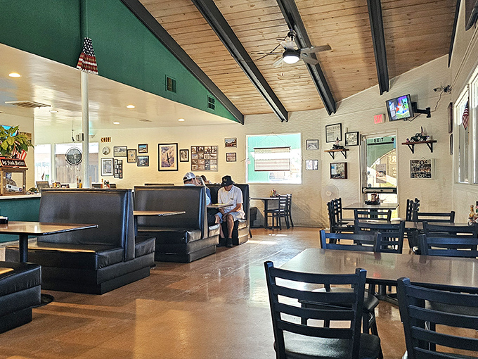 Inside, wooden ceiling beams and classic booth seating create that perfect diner atmosphere where comfort food and conversation flow freely.