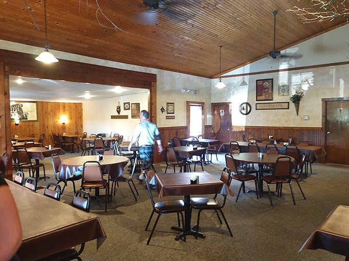 Knotty pine paradise where conversations flow as freely as the coffee. The wooden ceiling beams have witnessed countless "best meal ever" declarations.