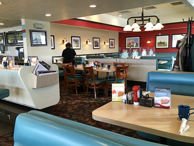 Classic diner aesthetics done right&mdash;teal vinyl booths, warm lighting, and that unmistakable feeling you've just walked into somewhere that knows what it's doing.