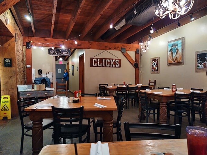 Rustic wooden beams and Western decor create an atmosphere where you instantly know serious steak business happens here.
