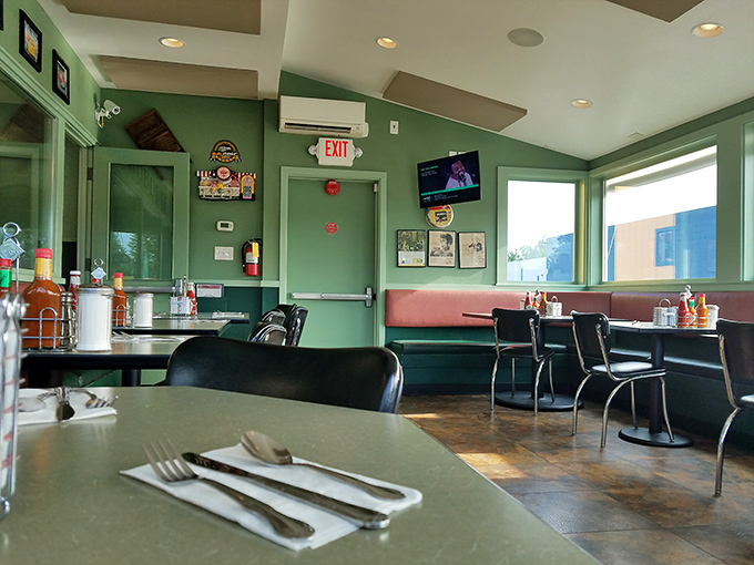 Mint green walls and classic diner booths create that timeless "I've been coming here for decades" feeling. Comfort starts before the food even arrives.
