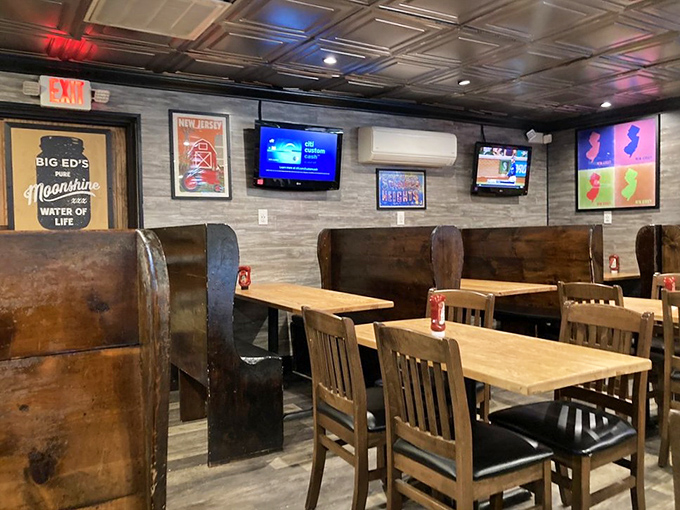 Inside, wooden booths and tin ceiling panels create that perfect balance of rustic charm and serious barbecue business. The New Jersey memorabilia reminds you exactly where this smoky paradise resides.