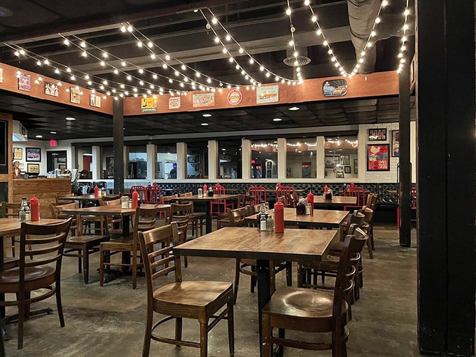 String lights dance overhead in this warm, inviting dining room where wooden tables have witnessed countless Nebraska stories unfold over steaming plates.