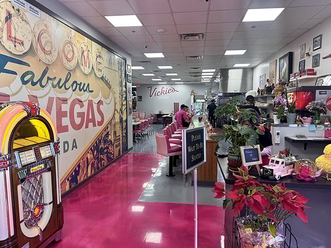 Step into a time capsule of Americana, complete with a bubblegum pink floor that's as bold as a showgirl's smile. It's like the 1950s and modern-day Vegas had a love child, and it's delicious!