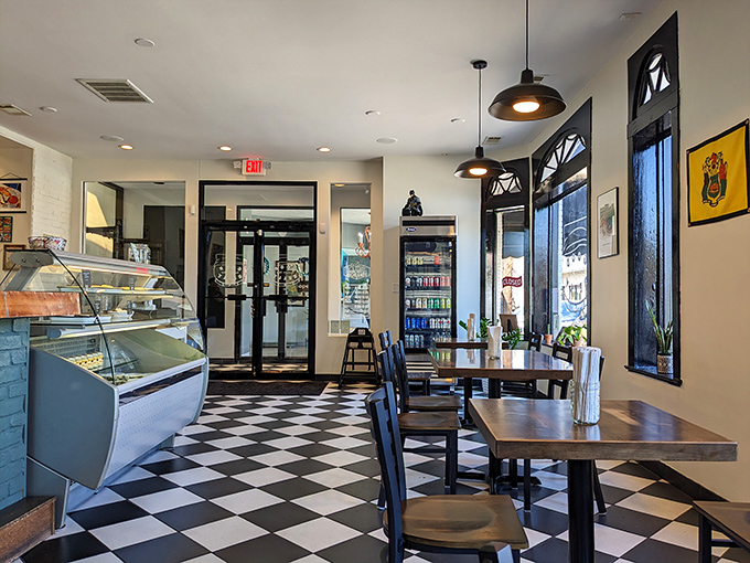 Classic checkerboard floors and warm lighting create that perfect "I've just discovered my new favorite place" feeling. Nostalgia without the dustiness.
