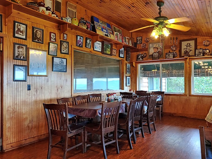 Wood-paneled walls adorned with memorabilia create the perfect backdrop for comfort food conversations. Like dining in a museum of Ozark nostalgia.