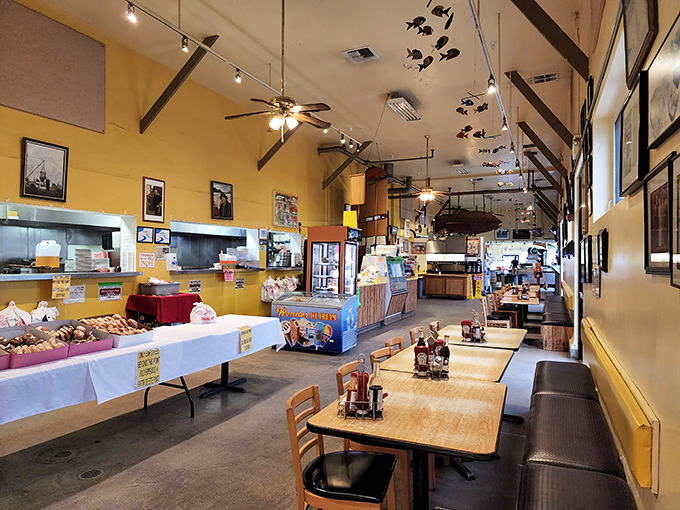 Sunshine-yellow walls and hanging fish create the perfect backdrop for seafood adventures. This isn't designer-curated ambiance&mdash;it's authentic maritime charm that's marinated for decades.