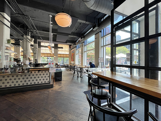 Sunlight floods the airy interior where vintage meets modern, creating the perfect backdrop for serious noshing and leisurely schmoozing.