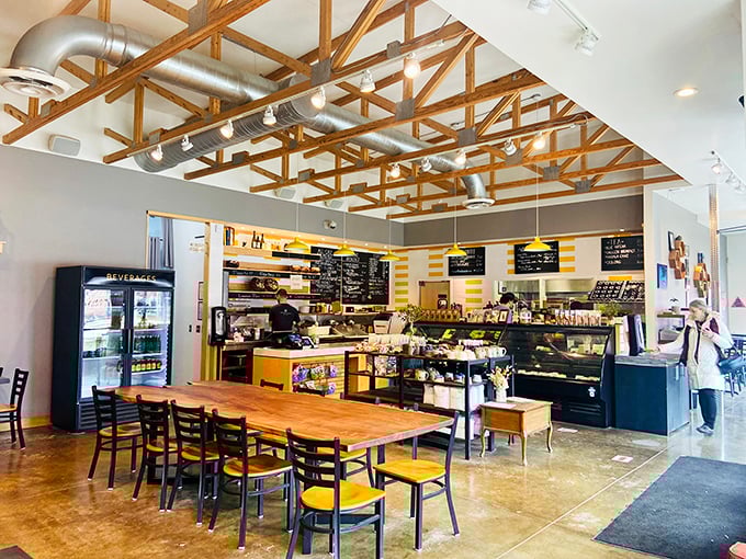 Industrial chic meets bread laboratory in this airy space where wooden ceiling trusses frame culinary magic below. Yeast alchemy happens here daily.