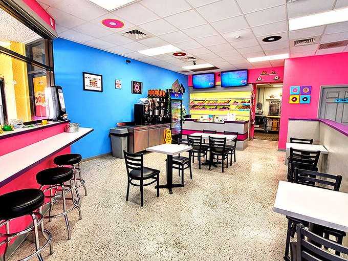 Step into a world where pink meets blue in a retro-cool interior that feels like the inside of a joyful kaleidoscope. Calories don't count in places this happy.