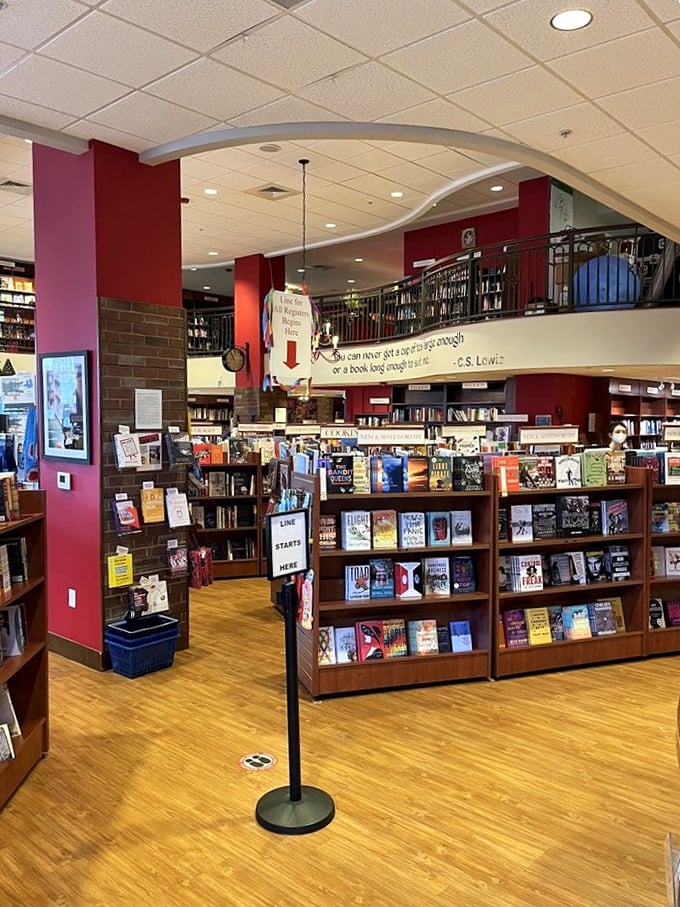 Two glorious floors of literary treasures await, with that C.S. Lewis quote reminding us all that books and tea are life's perfect companions.