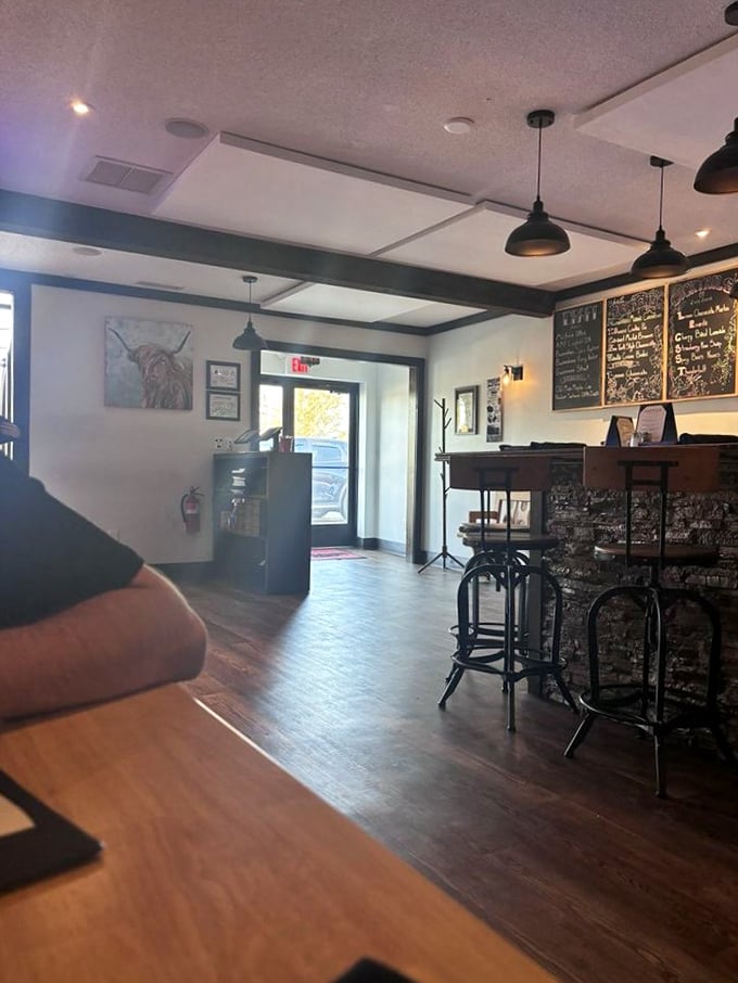 Where mountain charm meets culinary excellence. The warm woods and pendant lighting create the perfect backdrop for the serious business of steak appreciation.