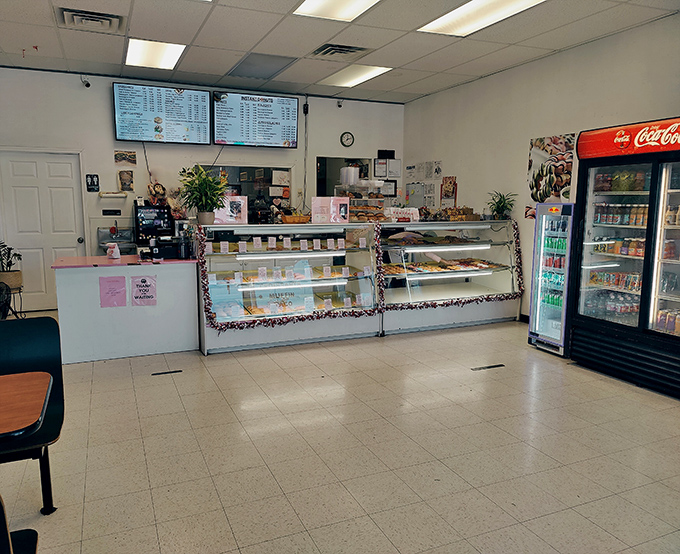 No-frills simplicity reigns inside, where fluorescent lighting illuminates what matters most: display cases filled with freshly made delights awaiting their destiny.