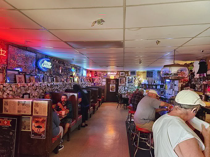 Inside, decades of memories line the walls alongside neon beer signs. This isn't interior design&mdash;it's a living museum of good times and great meals.