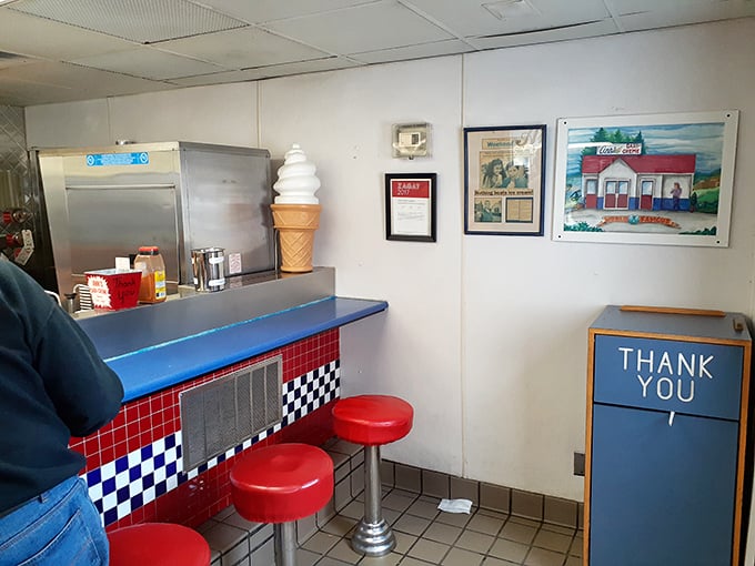Inside, the classic diner aesthetic isn't retro by design&mdash;it's authentic by survival. That ice cream cone statue has witnessed decades of satisfied smiles.