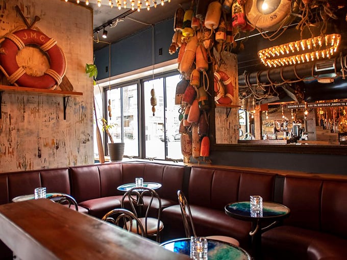 Nautical nostalgia fills every corner with life preservers, buoys and burgundy booths that invite you to settle in for a long voyage of food and drinks.