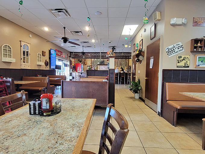 Step inside and you're transported to a simpler time. Wood paneling, comfortable booths, and the gentle hum of conversation create the perfect comfort food soundtrack.