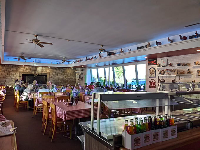 Red checkered tablecloths and duck decoys create that perfect "grandma's dining room meets roadside Americana" vibe that makes comfort food taste even better.