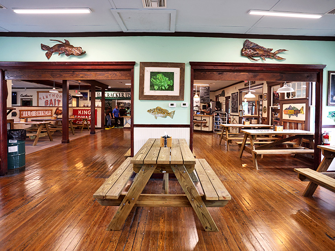 Wooden picnic tables and fish-adorned walls create the perfect no-nonsense atmosphere for serious seafood consumption. This isn't dinner theater&mdash;it's the main event.