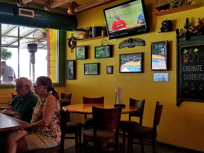 Inside, yellow walls serve as a gallery of fishing memorabilia and sports on TV. The perfect backdrop for serious eating with zero pretension.