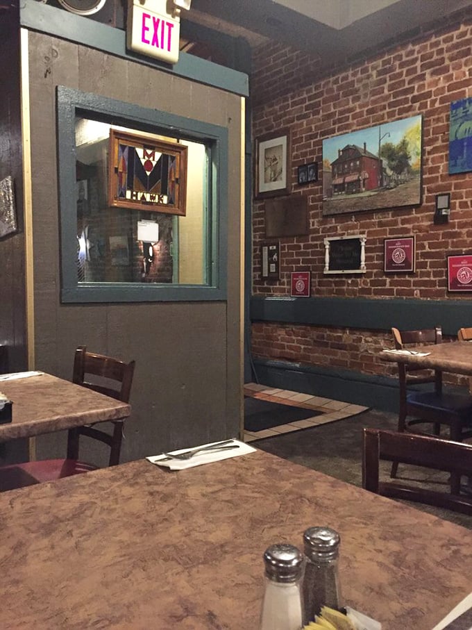 Exposed brick walls tell stories of countless meals shared while the warm, rustic interior invites you to settle in and stay awhile.