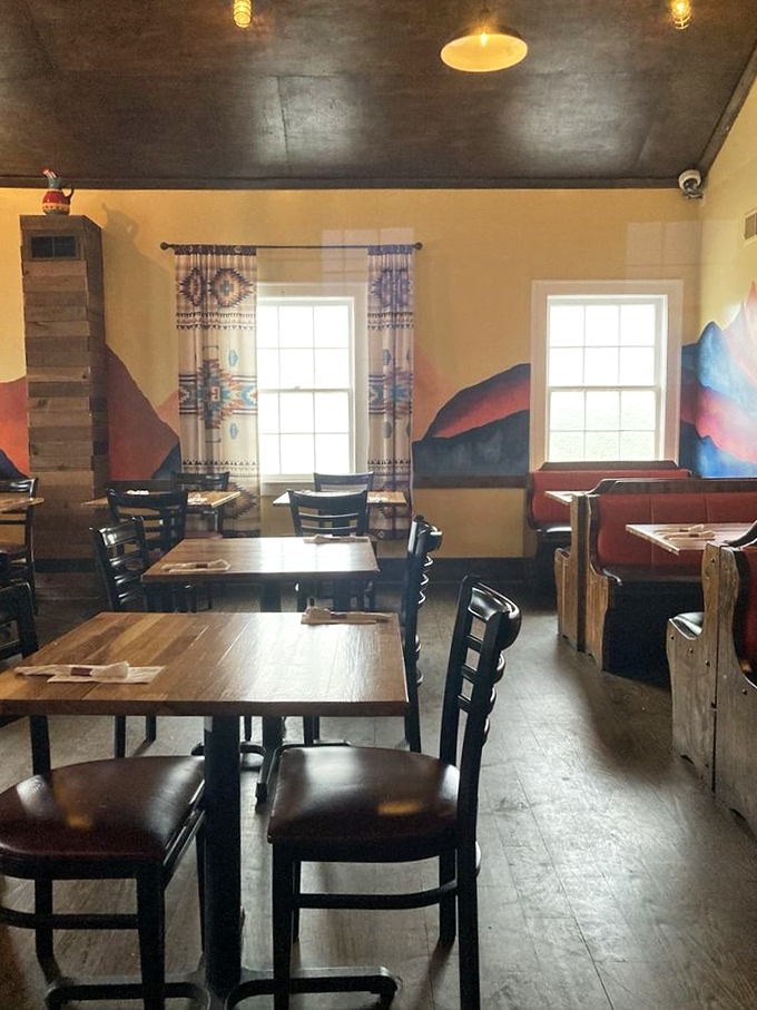 The warm yellow walls and southwestern-inspired decor create that perfect "welcome home" feeling, if home happened to serve incredible chimichangas.