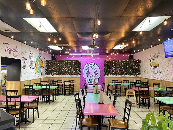 Inside BIRRITACO, string lights and plant walls create an ambiance that says, "Yes, we're serious about tacos, but we don't take ourselves too seriously."