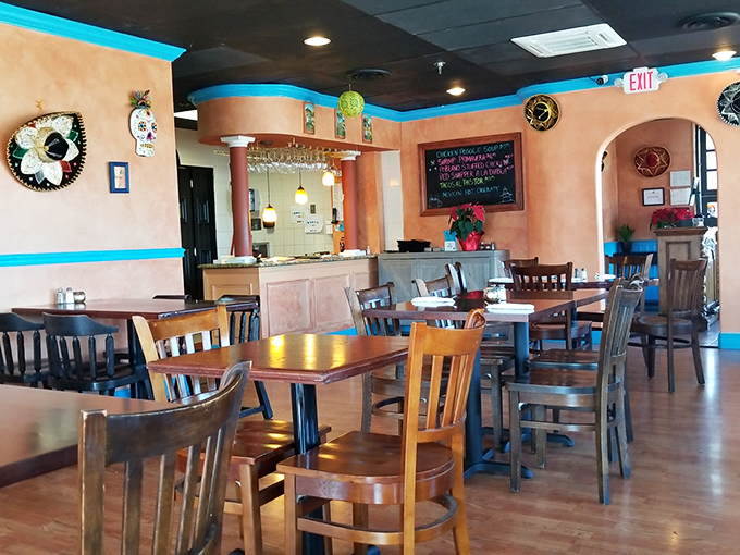 Terra cotta walls and turquoise accents create that magical "I've been transported somewhere special" feeling the moment you step inside.