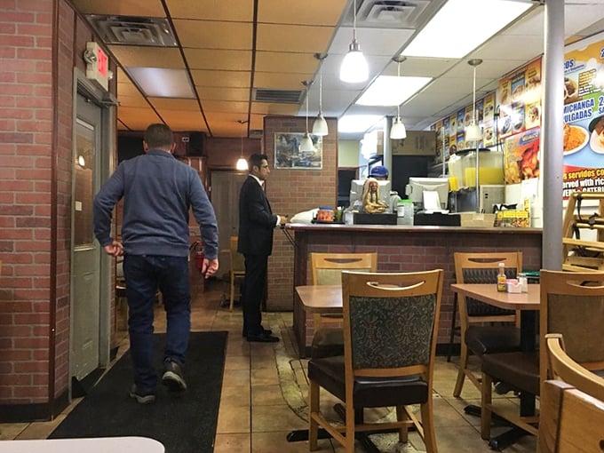 Simple wooden tables and brick walls set the stage for culinary drama. No white tablecloths needed when the food delivers this much star power. 
