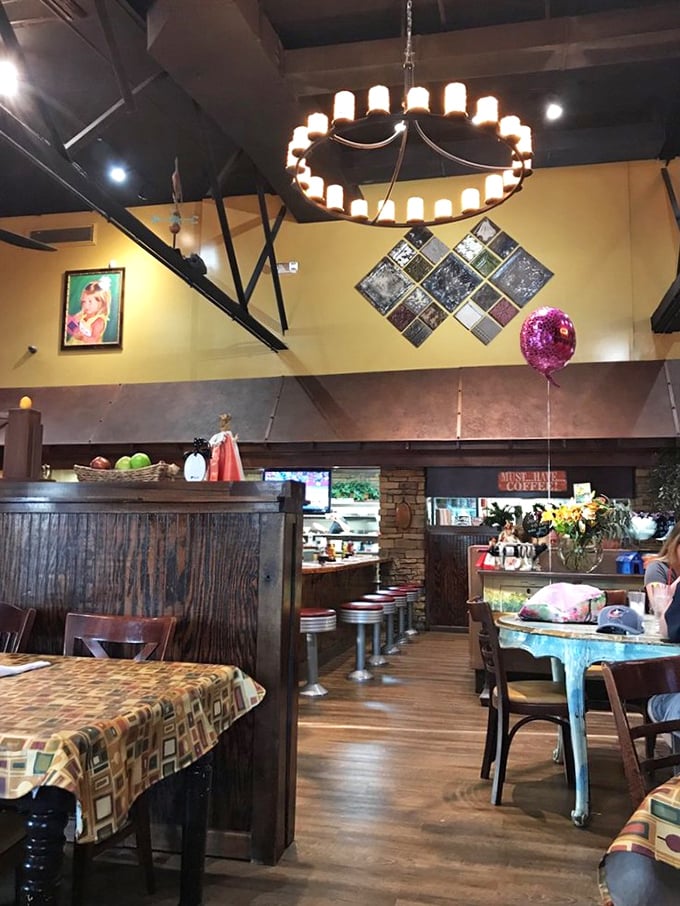 The circular chandelier and warm yellow walls create the perfect atmosphere for contemplating life's big question: sweet or savory?