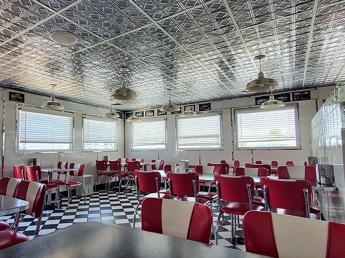 Those red and white vinyl booths aren't trying to be retro&mdash;they simply are. The pressed tin ceiling reflects decades of American dining history.