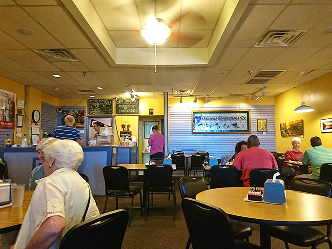 Sunny yellow walls and simple furnishings create that rare atmosphere where both regulars and first-timers feel instantly at home.