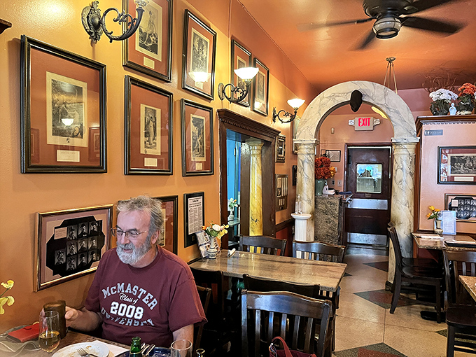 Step inside and you're transported to Greece &ndash; warm walls adorned with framed memories and marble accents create an atmosphere of authentic Mediterranean charm.