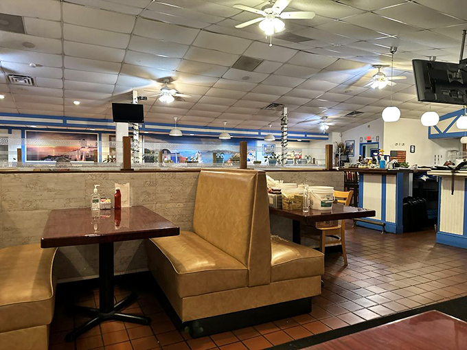 Cozy booths and classic blue accents create that perfect neighborhood taverna vibe &ndash; casual enough for Tuesday dinner, special enough for celebrations.