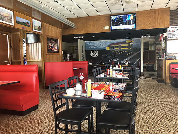 Inside, cherry-red booths and Route 66 memorabilia create the perfect backdrop for breakfast conversations that flow as freely as the coffee refills.