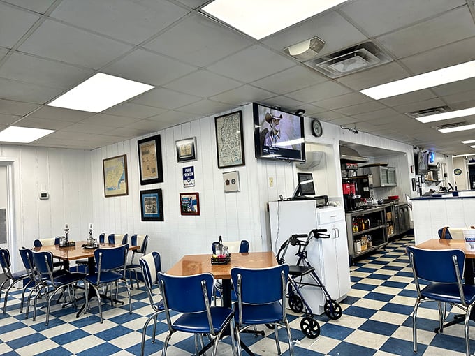 Classic blue chairs and checkerboard floors&mdash;the universal code for "good food served without pretension." This is where memories are made, one meal at a time. 