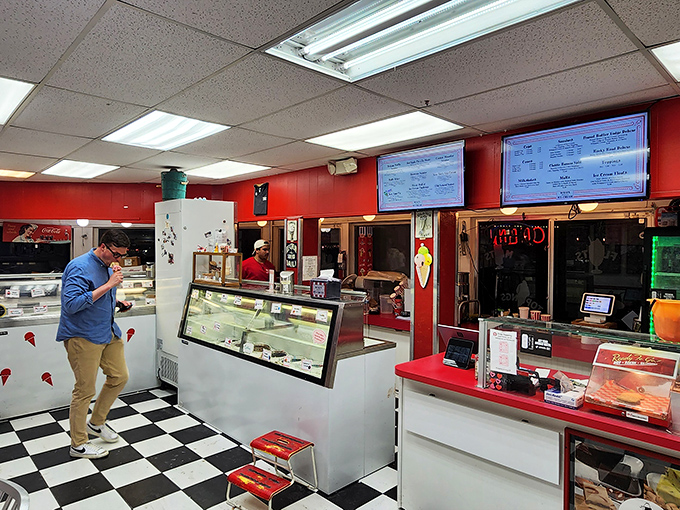Inside, the black and white checkered floor announces you've entered the ice cream equivalent of Shangri-La, where calories don't count and joy is served by the scoop.