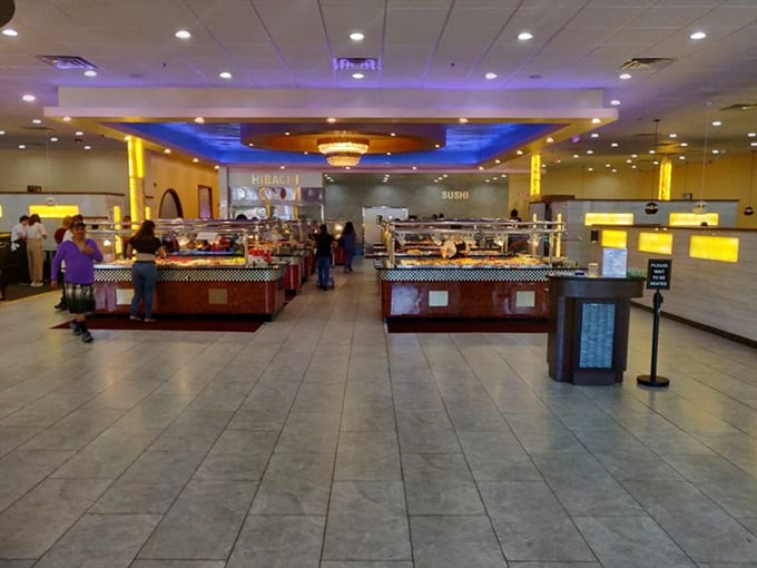 Step inside and the buffet wonderland unfolds&mdash;gleaming stations under blue accent lighting and a chandelier that adds a touch of unexpected elegance to your all-you-can-eat quest.