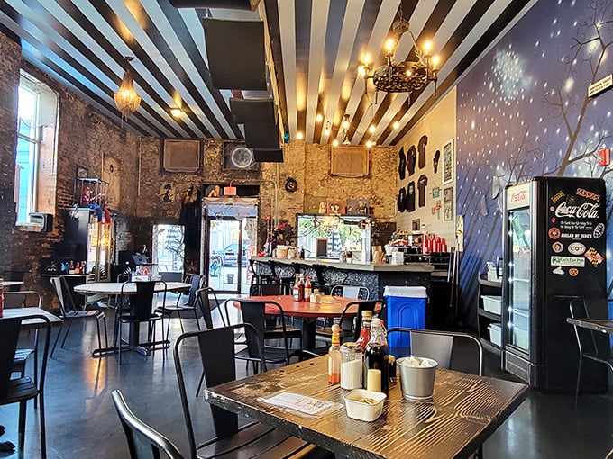 Step inside and the whimsical blue-striped ceiling feels like dining under a circus tent designed by a breakfast-obsessed artist with impeccable taste.