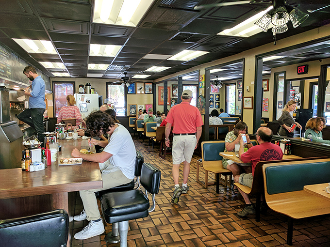 The bustling interior hums with conversation and clinking plates. This is Charleston's breakfast symphony, performed daily to a packed house of devoted fans.