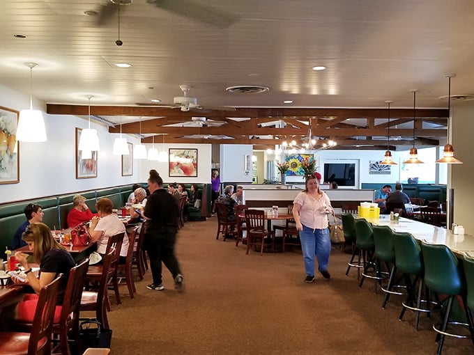 Where breakfast dreams come true. The bustling interior balances farmhouse charm with practical comfort, creating the perfect backdrop for morning feasts.