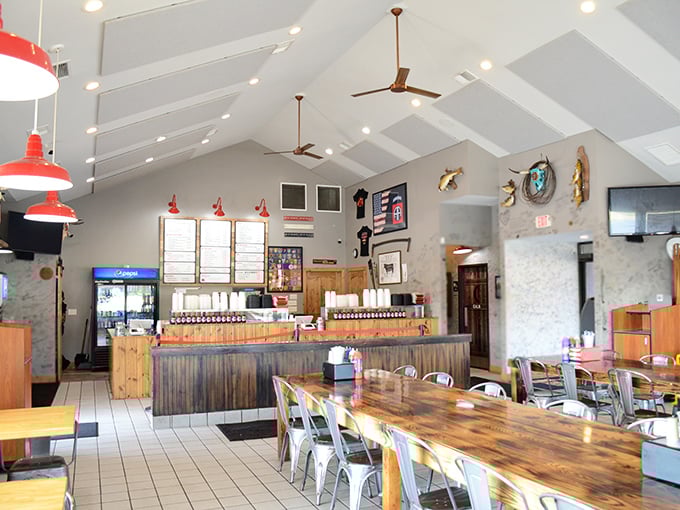 High ceilings, rustic wood, and the promise of meat nirvana. This isn't just a dining room—it's a cathedral of carnivorous delights.