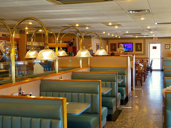 Classic diner aesthetics meet cozy restaurant comfort with teal vinyl booths and brass accents creating that perfect "everybody knows your name" ambiance.
