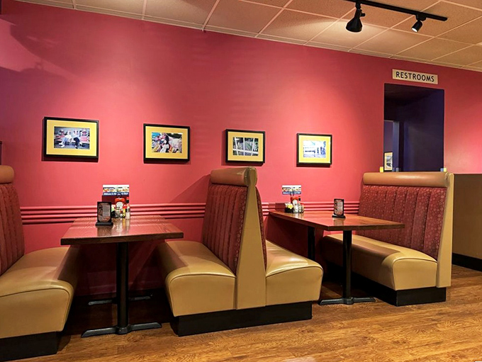 Coral-colored walls and comfy booths create the perfect backdrop for breakfast drama. This isn't just dining&mdash;it's theater where your taste buds get front-row seats.