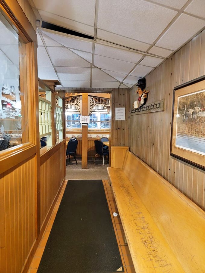 Step inside and feel the decades of dining history in these wood-paneled walls. The entrance alone promises comfort food paradise awaits.